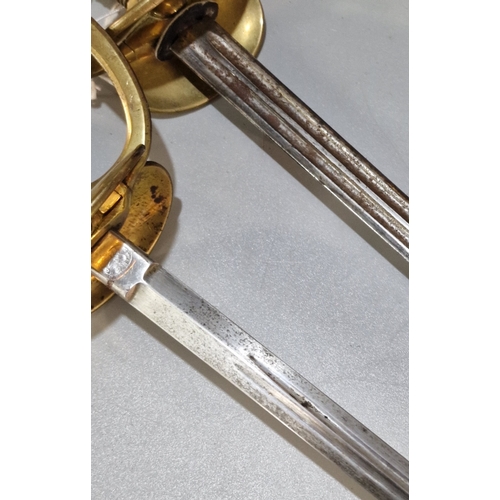 Two French 19th century 1872 pattern Eppe Officer's swords, both with ...