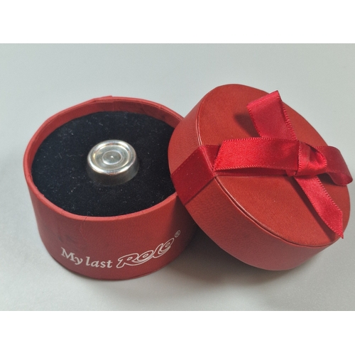 Solid silver 'My Last Rolo', in original box, maker's mark CWS ...
