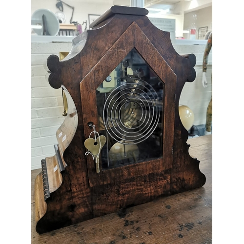 19th century walnut two train bracket clock, having scroll and foliate ...