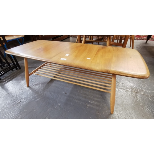Ercol elm and beech rectangular coffee table with slatted under-tier. 105cm wide approx. (B.P. 21%