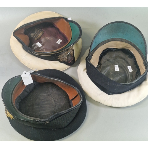 Collection of three naval caps, comprising a Royal Navy Captain ...