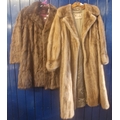Regency Furs, a fur coat together with another fur coat/jacket. (2) (B ...