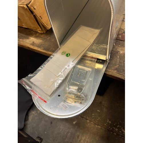 Two aluminium U.S. mailboxes, marked 'approved by the Postmaster ...