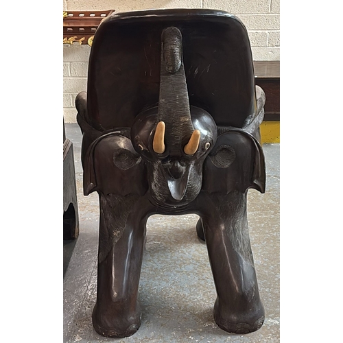 Pair of unusual exceedingly heavy African hardwood Elephant chairs in ...