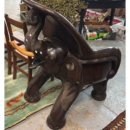 Pair of unusual exceedingly heavy African hardwood Elephant chairs in ...