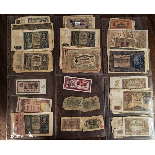 Collection of assorted foreign bank notes to include: Iran, Poland etc ...