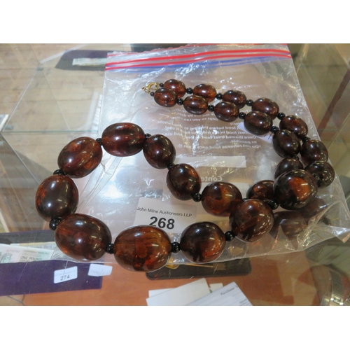 Graduated String of Amber Type Beads and Matching Earrings
