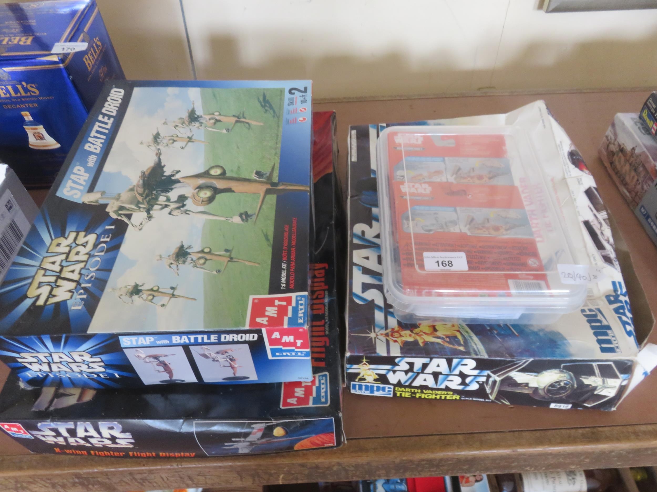 Two AMT Star Wars Episode 1 Model Kits and MPC Darth Vaders Fighter Model Kit and one other