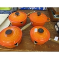 Four Lidded Le Crueset Pots