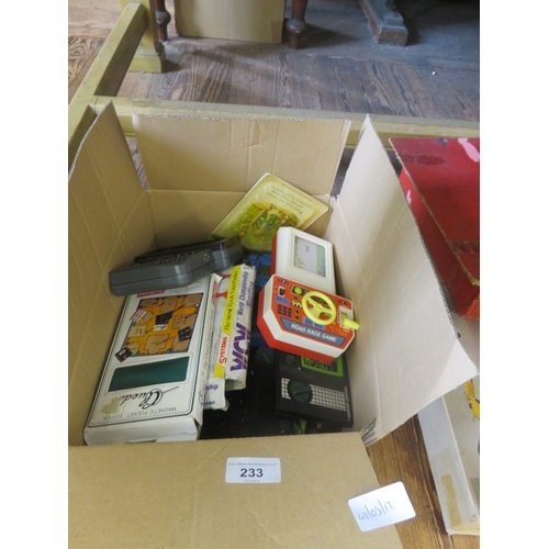 One Box of Handheld Electronic and Manual Games
