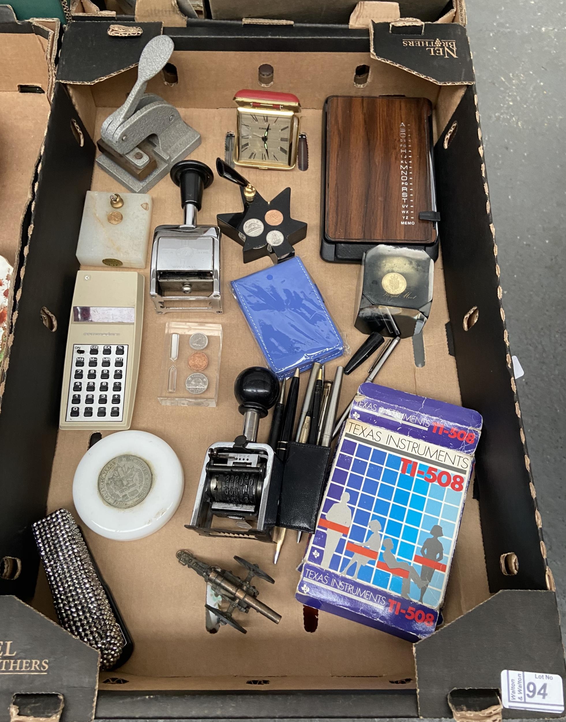 Box containing vintage office equipment and a Commodore calculator