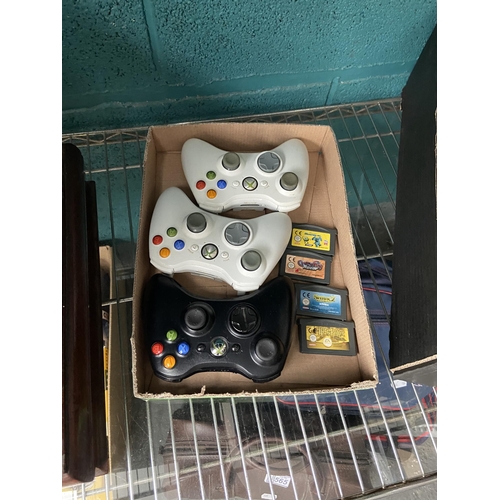 3 Xbox controllers and 4 Gameboy Advance games
