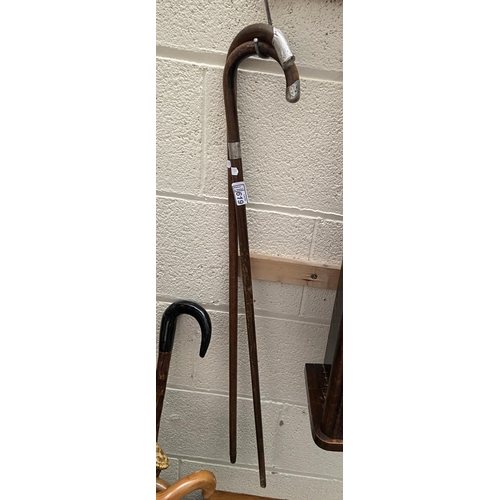 2 Walking sticks with silver mounts