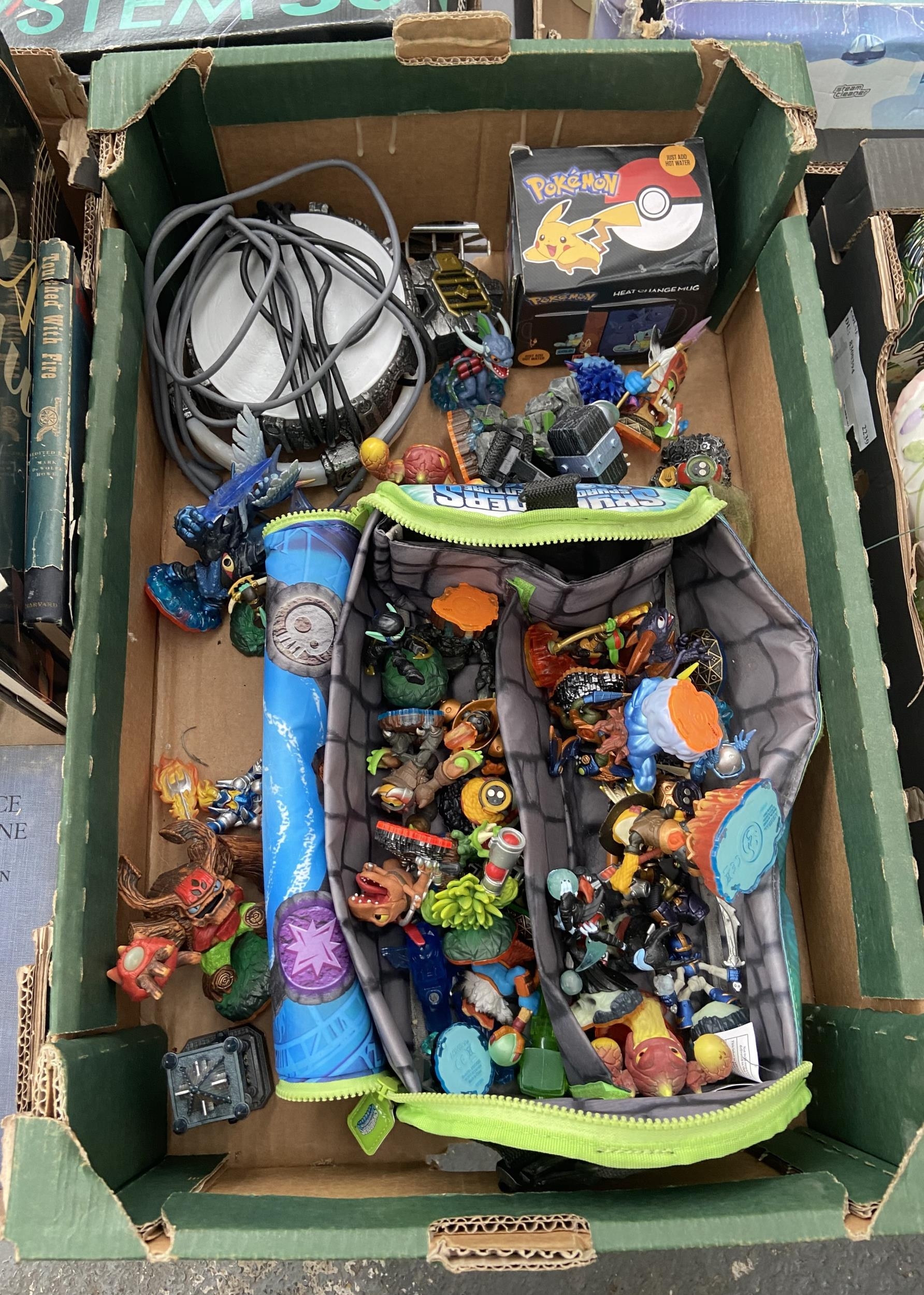Box containing Skylander figures