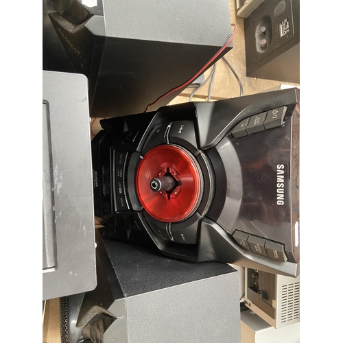 Sony and Samsung audio systems with speakers