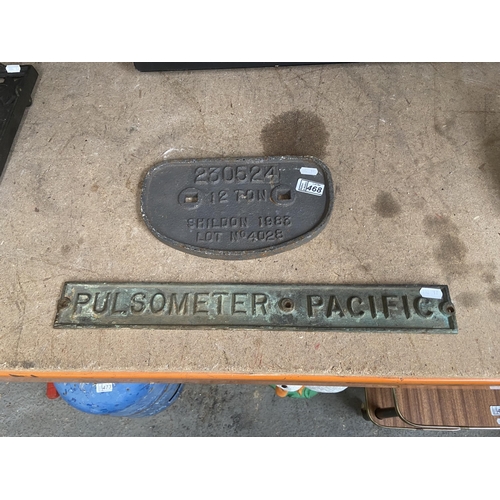 2 Vintage cast signs