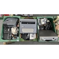3 Boxes containing assorted electronics including a Smith Corona typewriter, Kodak projector etc