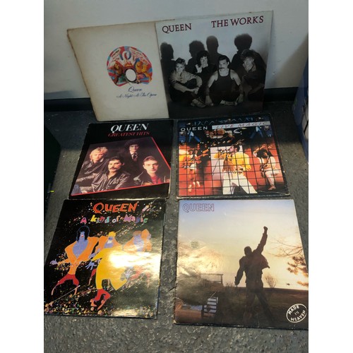Box containing Queen LPs and singles
