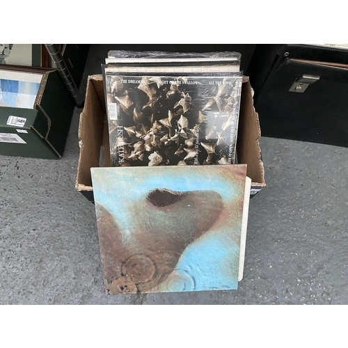 Box containing LPs including Pink Floyd and Kate Bush