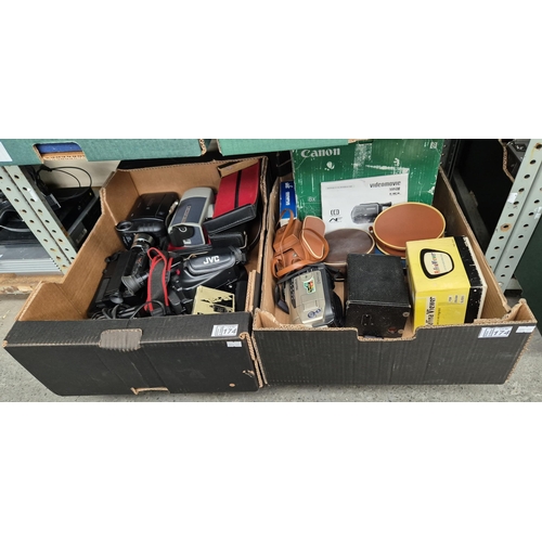 2 Boxes containing assorted cameras and video cameras including Bell & Howell