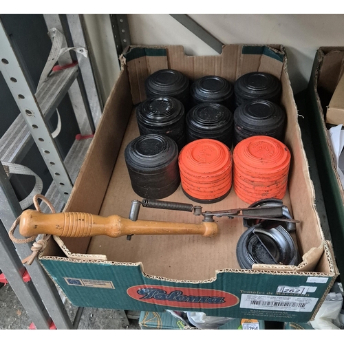 Box containing clay pigeons and launcher