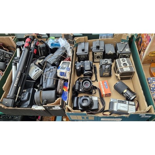 2 Boxes containing vintage cameras and accessories