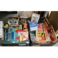 2 Boxes containing assorted toys and games including Action Men