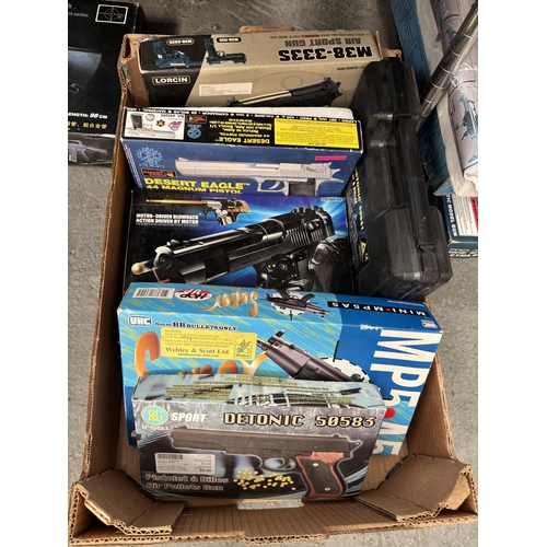 Box containing assorted airsoft pistols etc
