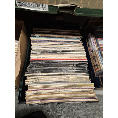 4 Boxes containing CDs and assorted LPs