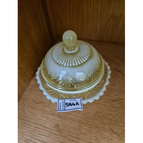 Davidson's yellow pearline glass 'Lords and Ladies' butter dish, c1896