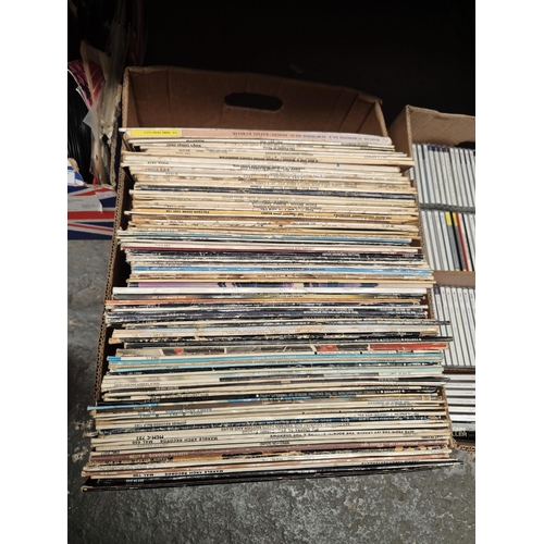 2 Boxes containing CDs and LPs including Flashdance