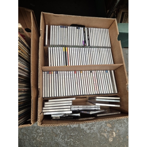 2 Boxes containing CDs and LPs including Flashdance