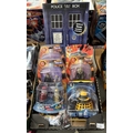 Box containing unopened Doctor Who merchandise including 'The Eleven ...