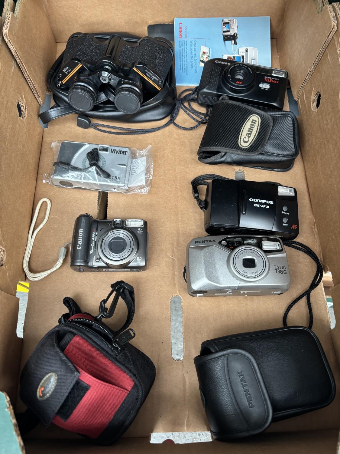 Box containing assorted cameras including Canon A590 and a set of Prinz ...