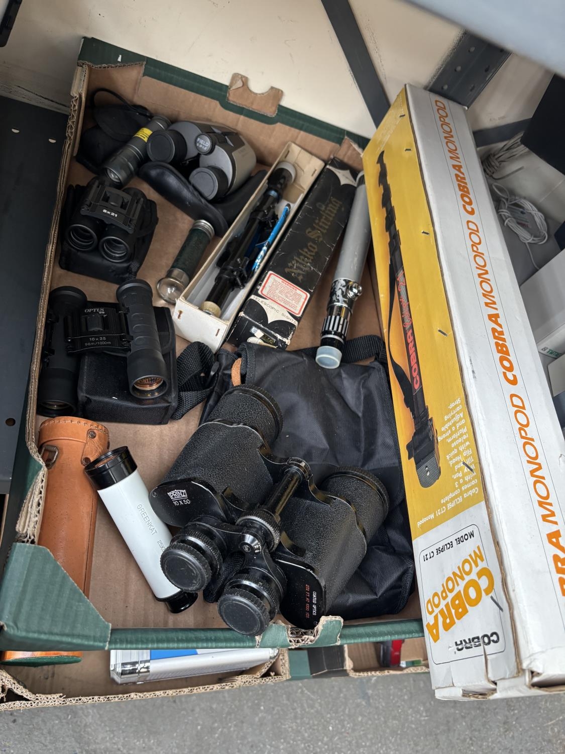 Box containing assorted binoculars and scopes including Prinz and Greenkat