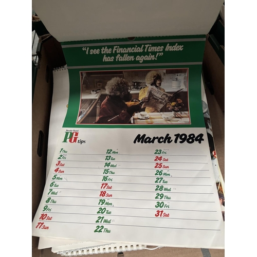 Box containing 1980s PG Tips chimp calendars