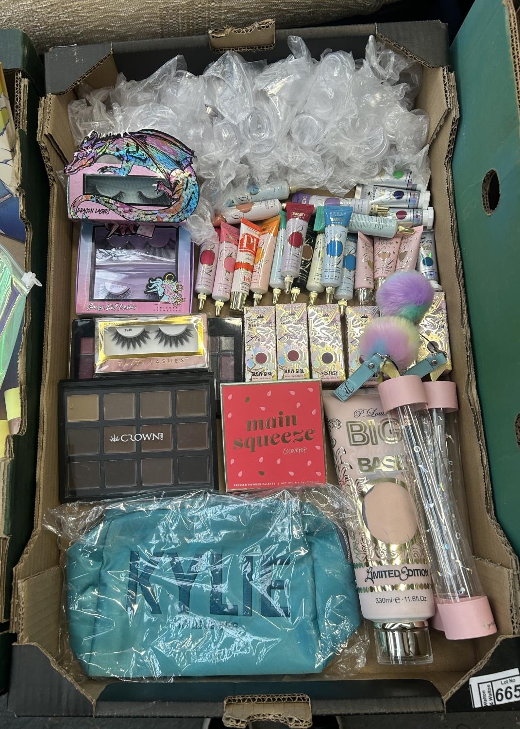 Box containing cosmetics including PLouise some new