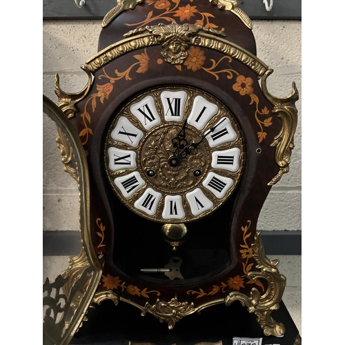 German clock by FHS in an ornate French style case including wall pedestal