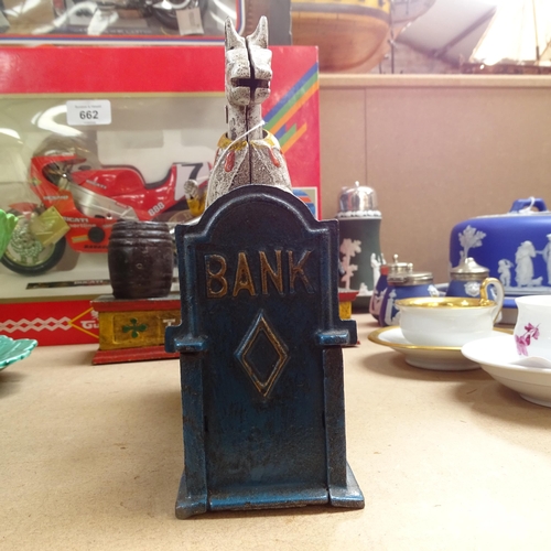 2 painted cast-iron novelty mechanical money boxes, height 18cm