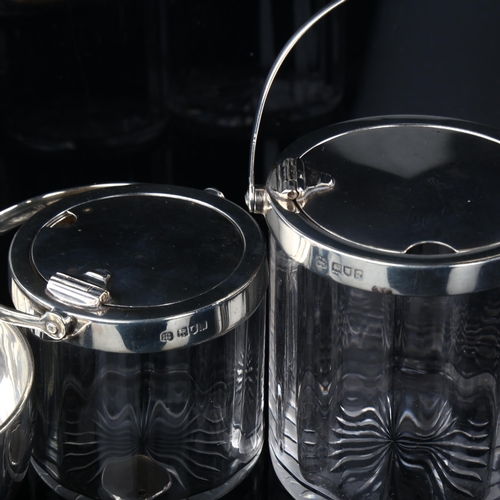 A graduated pair of Edwardian silver-mounted glass patent opening honey ...