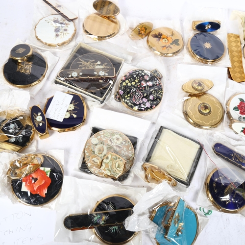 A collection of Vintage Stratton compacts, with lipsticks or pillbox etc
