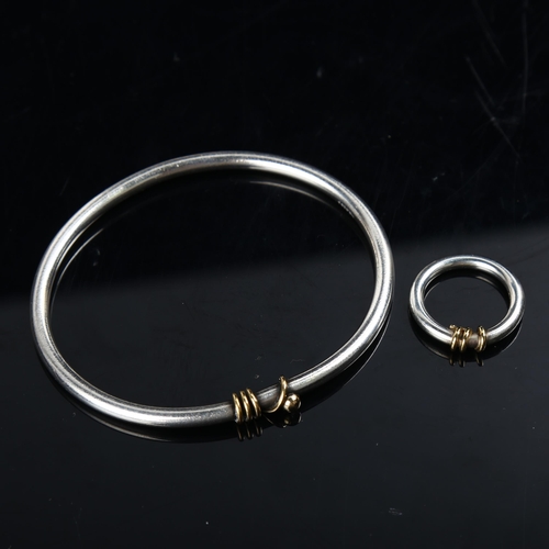 A similar Danish sterling silver and silver-gilt plain form wrap-around slave bangle and ring, band