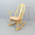 ERCOL - An EC62 rocking chair, with swan detail to back and original ...