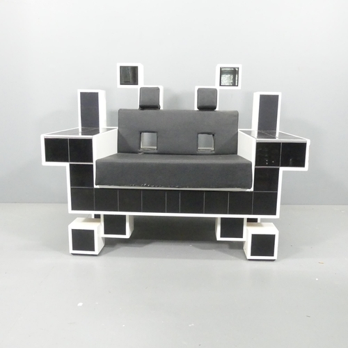 A hand made Space Invader lounge chair, fitted with concealed drawers ...