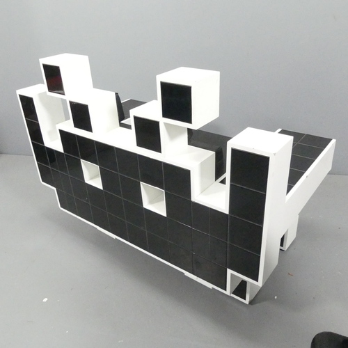 A hand made Space Invader lounge chair, fitted with concealed drawers ...