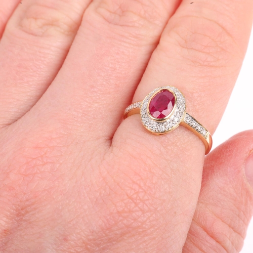 A modern 18ct gold ruby and diamond oval cluster ring, rub-over set ...