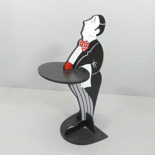 A painted dumb-waiter figure. Height 92cm.
