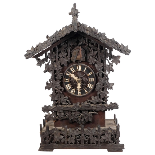 A Black Forest Vintage cuckoo clock, movement in the style of (Beha) A ...