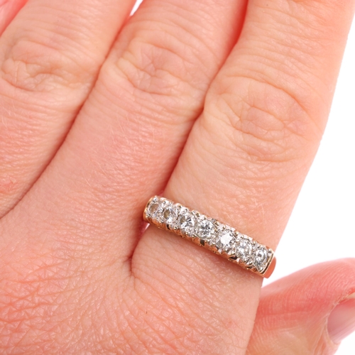 A 9ct gold seven stone diamond half hoop ring, set with modern round ...