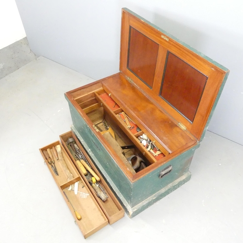 A painted pine tool-box, with slide fitted interior and containing ...